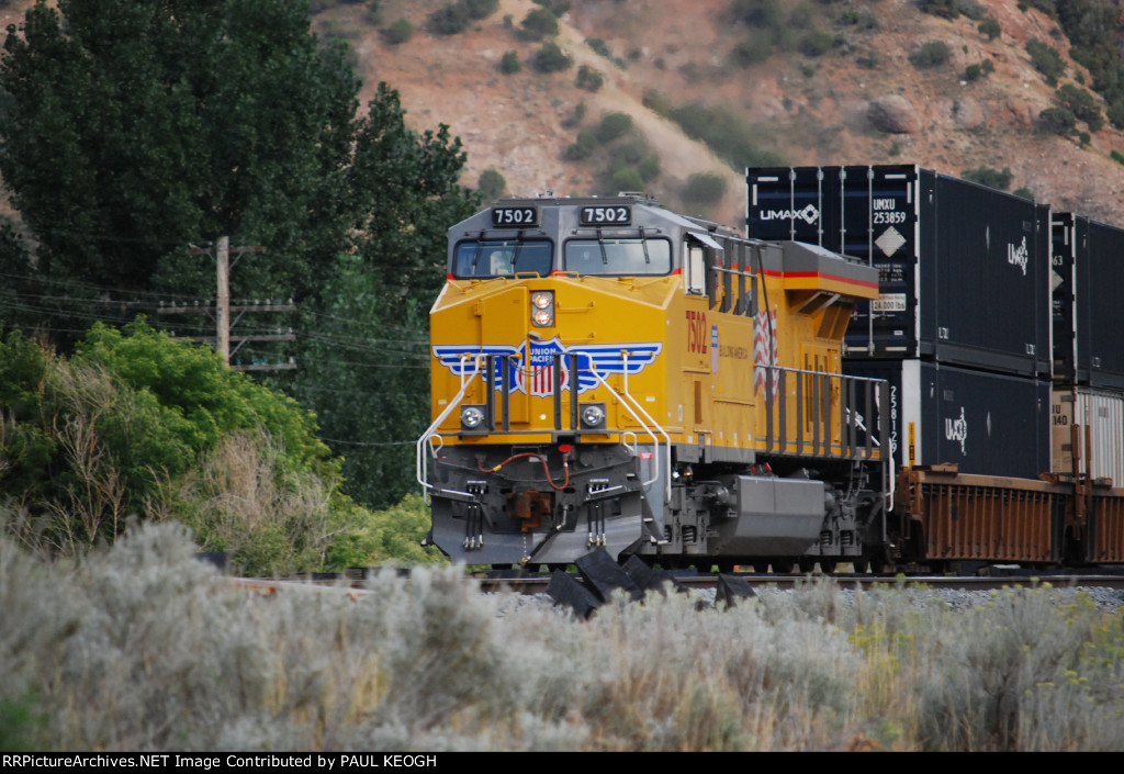 UP 7502 passes me by as she heads Northeast towards the I-84 and I-80 merge as a Rear DPU.
